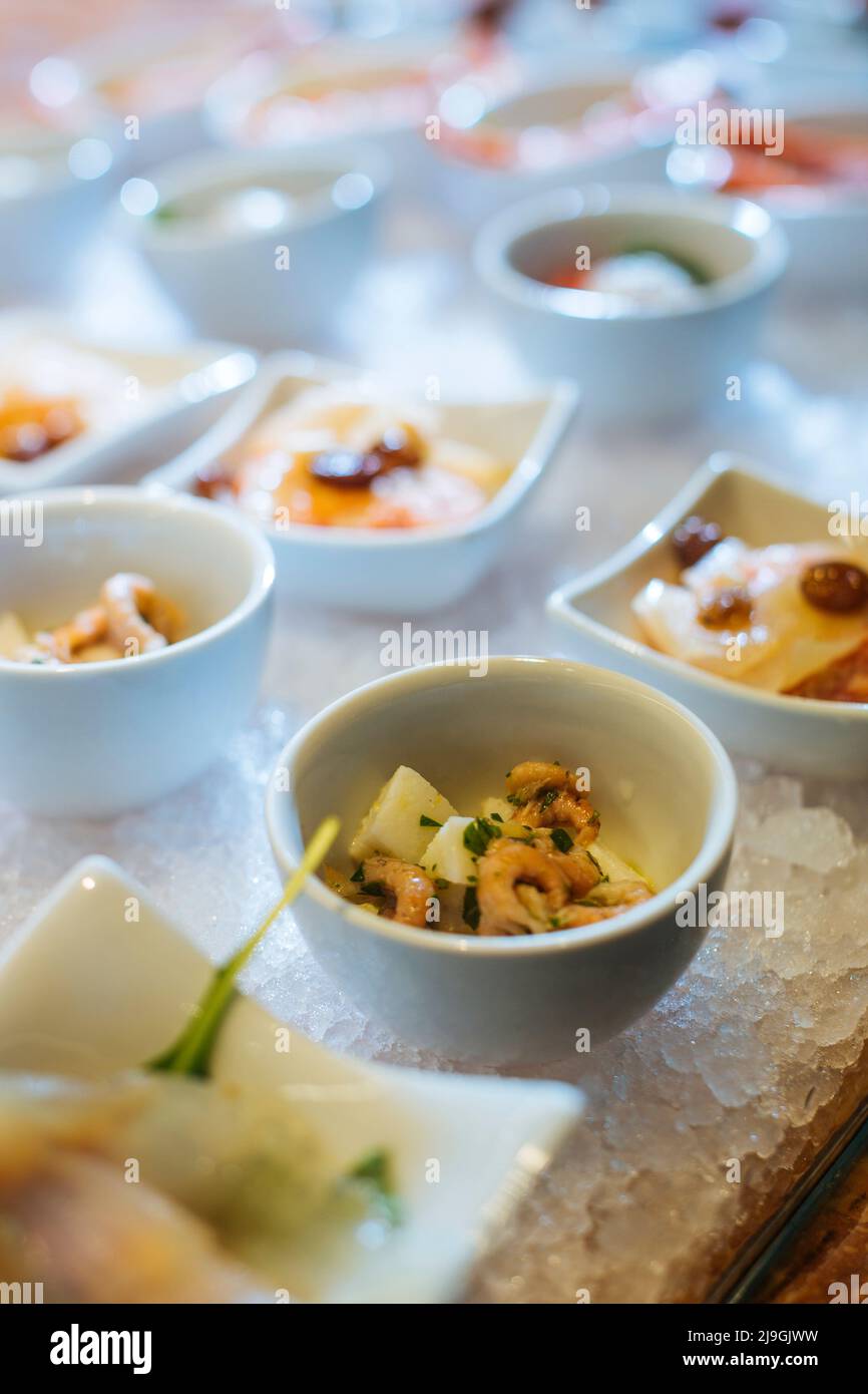 Venetian cicchetti Polenta e Schie or polenta and shrimp Stock Photo ...