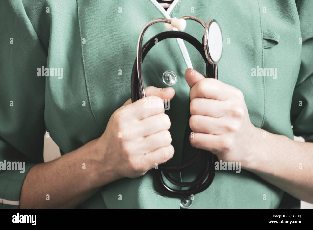 Doctor holding a stethoscope in his hands, health and medicine ...