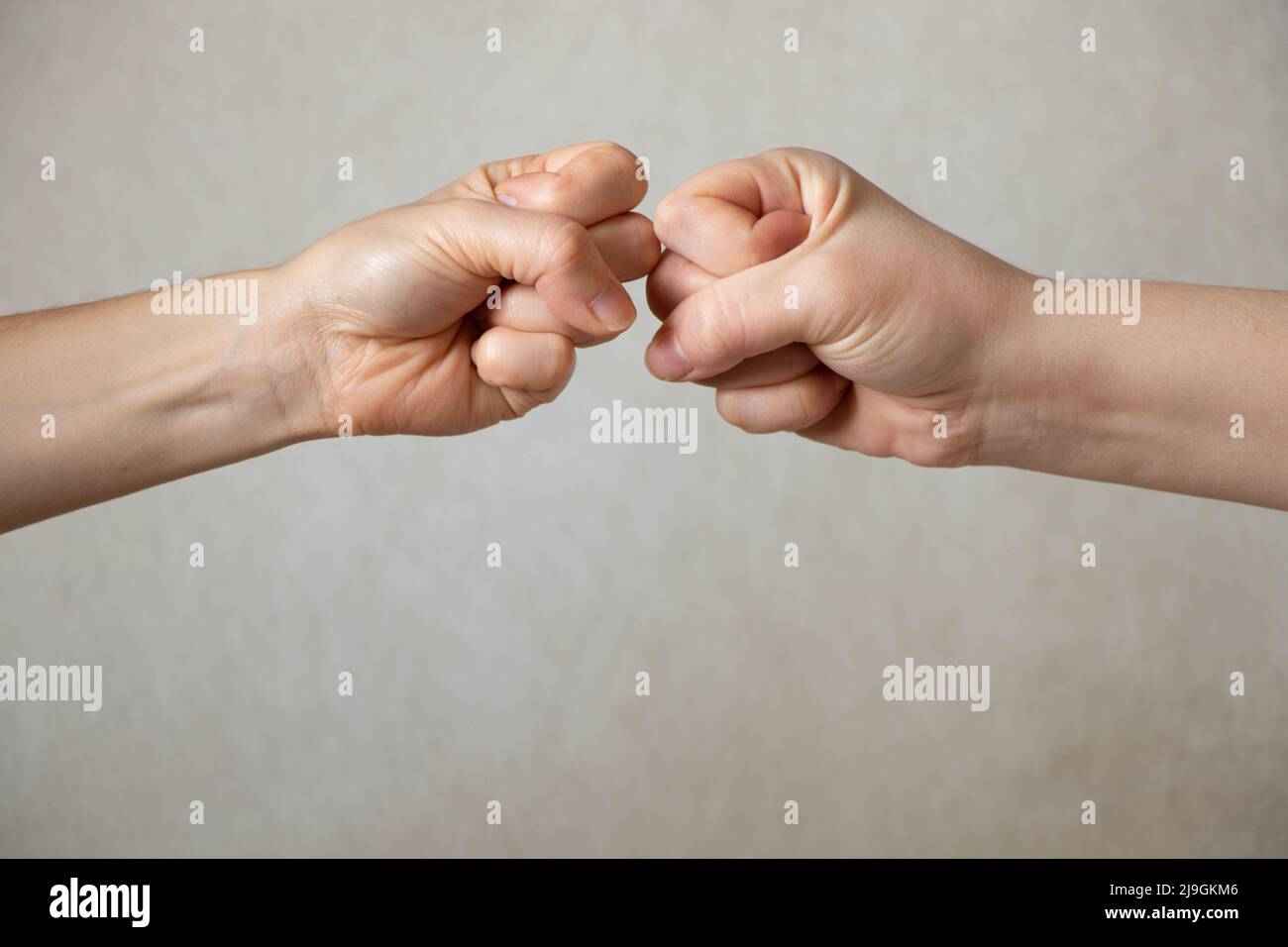two fists on an isolated background, strength and power, fight and war ...