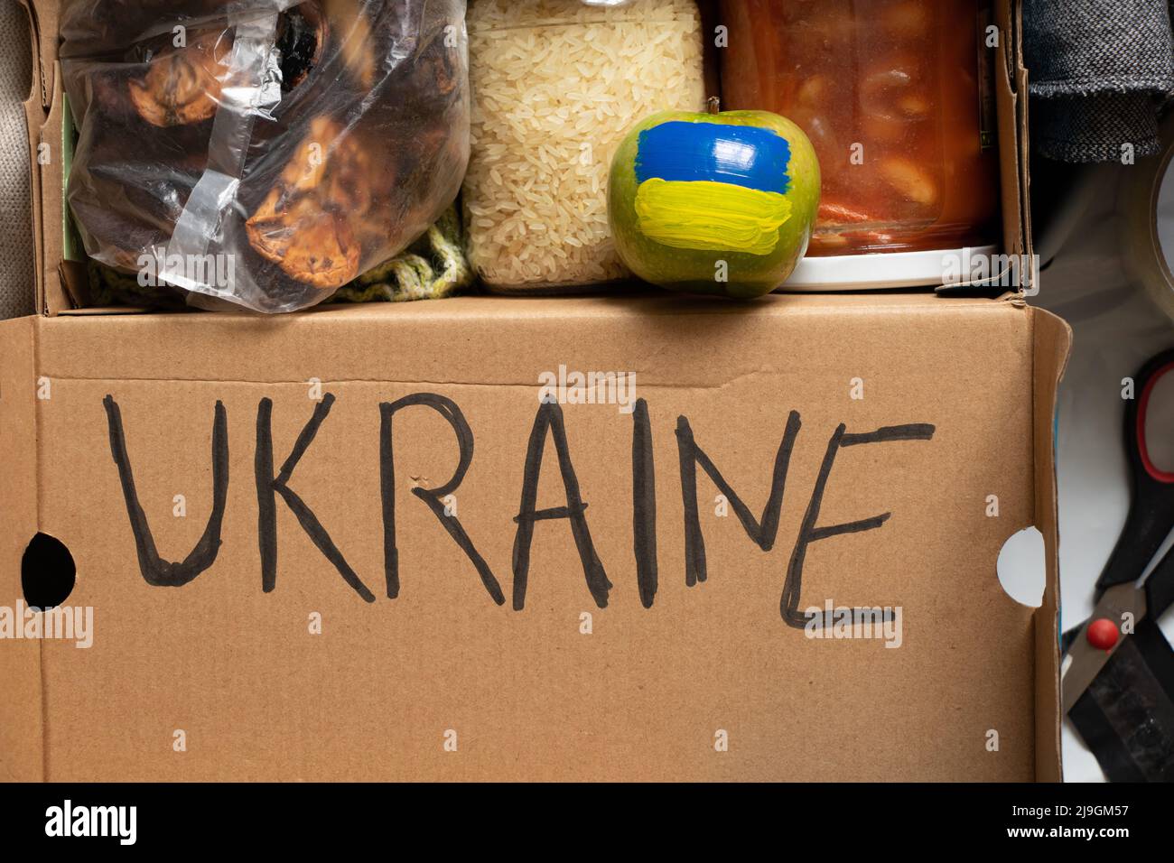 Collecting a humanitarian food set to help people who suffered during ...