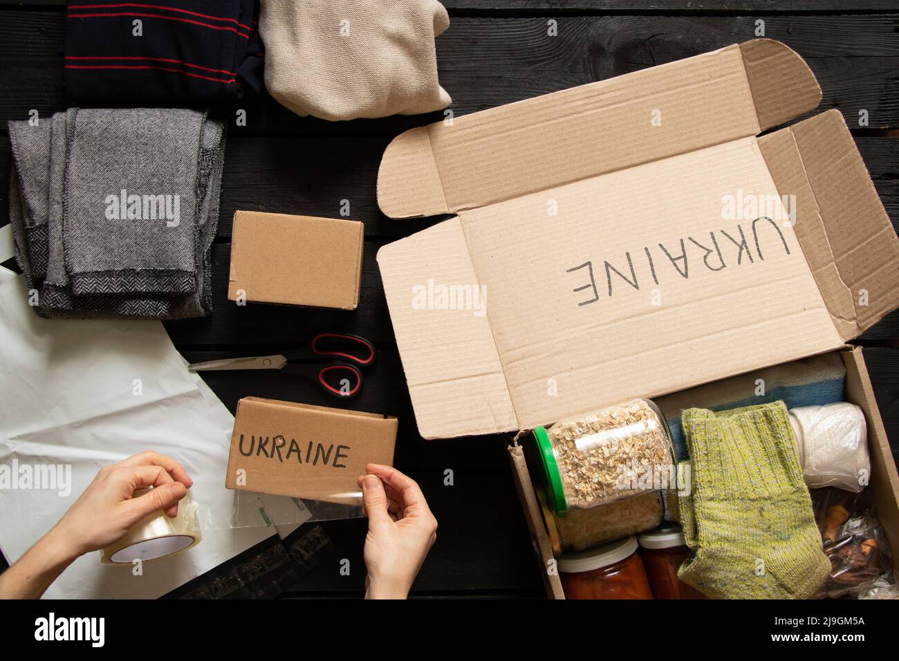 Collecting a humanitarian food set to help people who suffered during ...