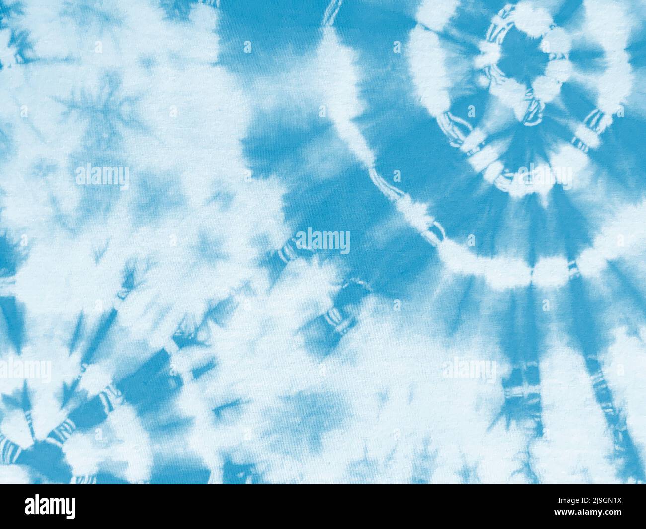 Tie dye shibori pattern. Abstract tie-dye technique hand dyed fabric ...
