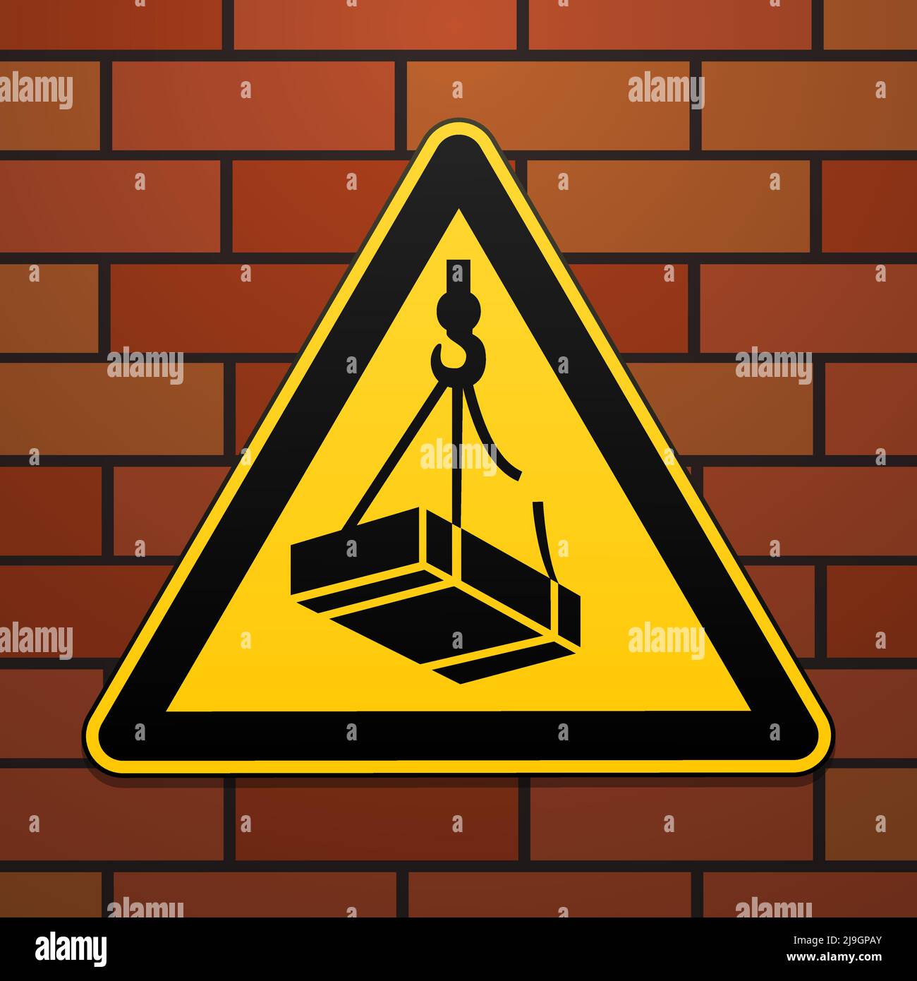 International safety warning sign. Beware of falling loads The sign on ...