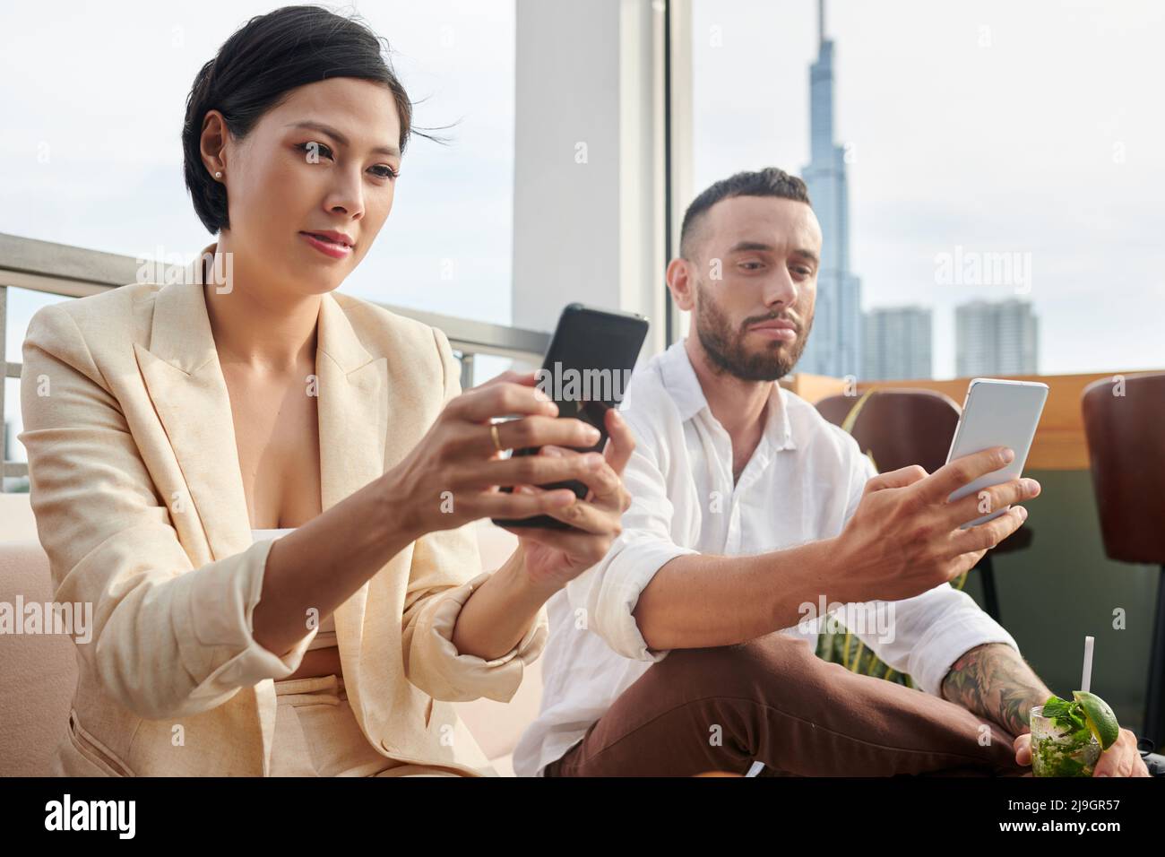 Group people checking out hi-res stock photography and images - Alamy