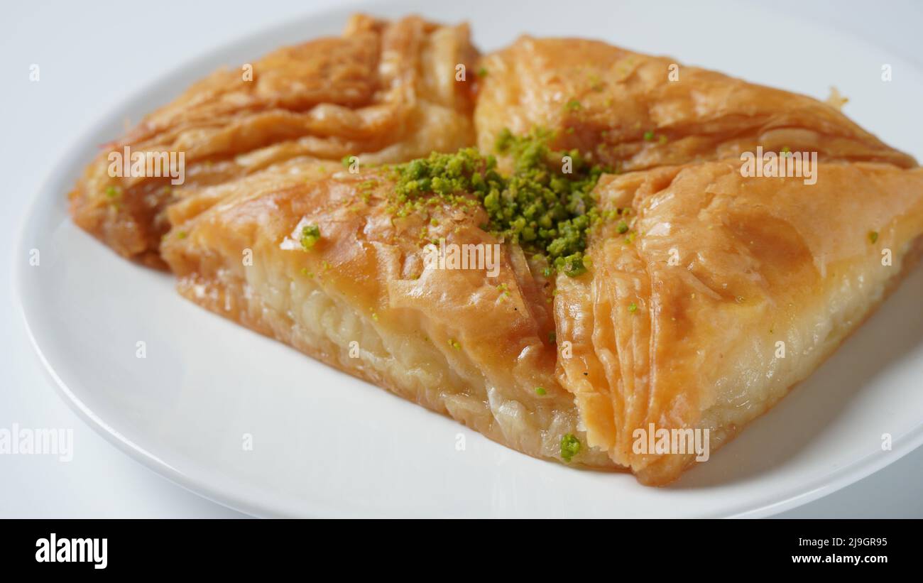 Baklava a layered pastry dessert made of filo pastry, filled with ...