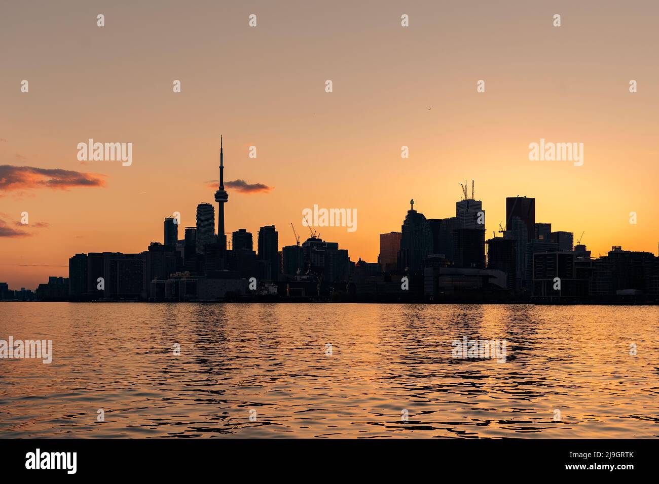 Toronto s skyline at dusk as seen from Polson Pier Stock Photo - Alamy