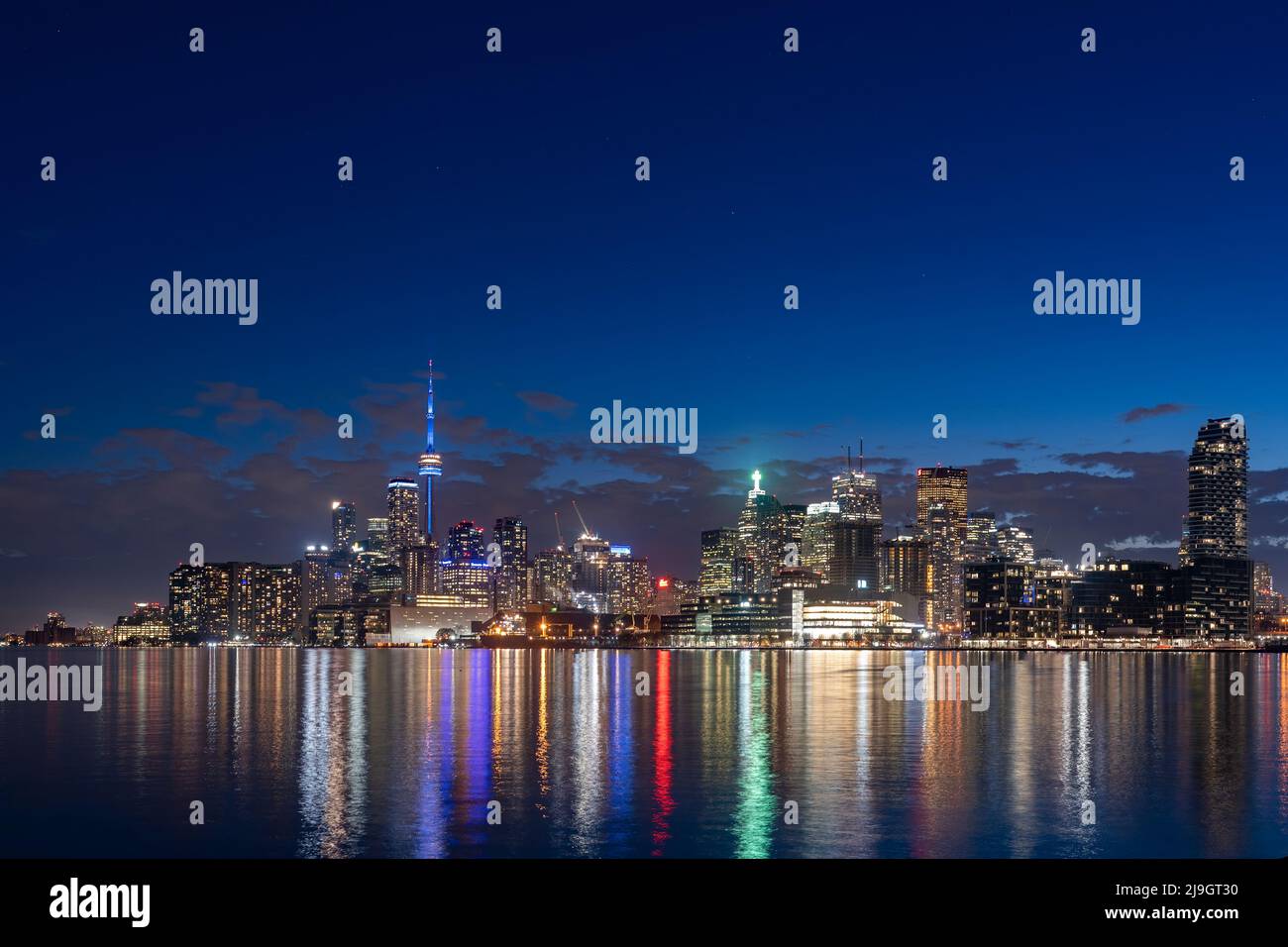 Toronto s skyline at dusk as seen from Polson Pier Stock Photo - Alamy