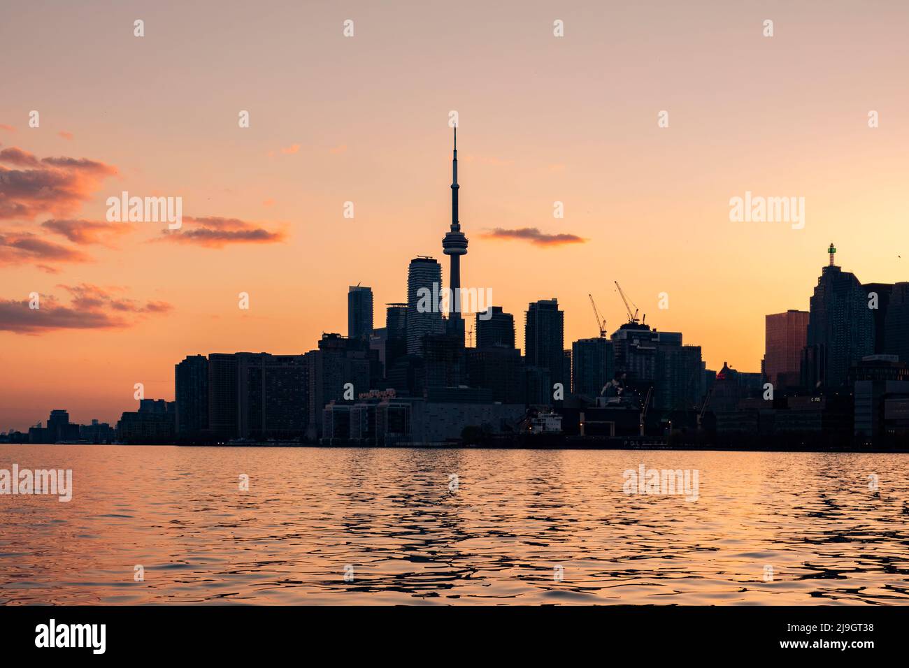 Toronto s skyline at dusk as seen from Polson Pier Stock Photo - Alamy