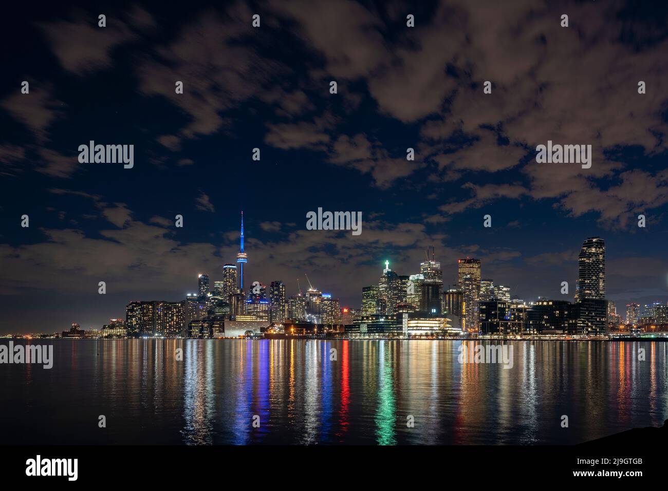 Toronto s skyline at dusk as seen from Polson Pier Stock Photo - Alamy