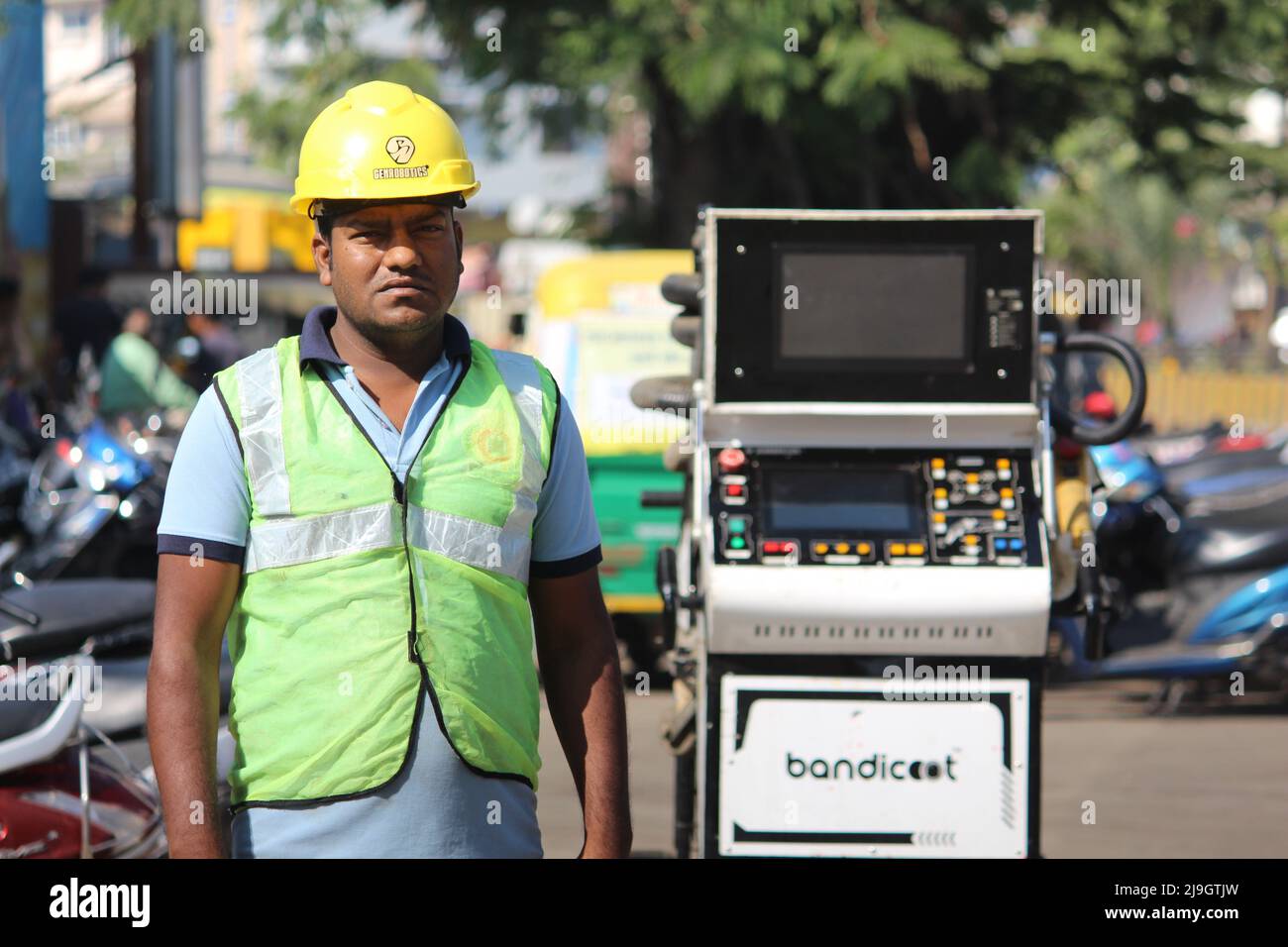 worker with Sewer Cleaning Robot, Unrecognizable road workers cleaning ...
