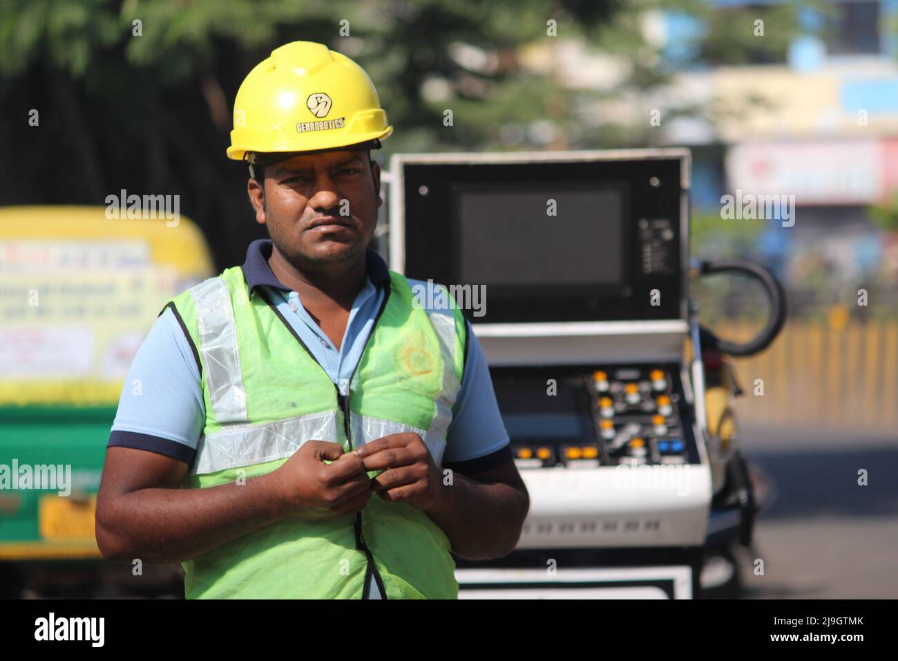 worker with Sewer Cleaning Robot, Unrecognizable road workers cleaning ...