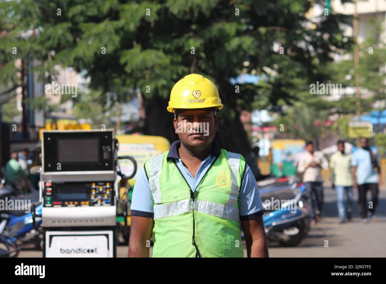 worker with Sewer Cleaning Robot, Unrecognizable road workers cleaning ...