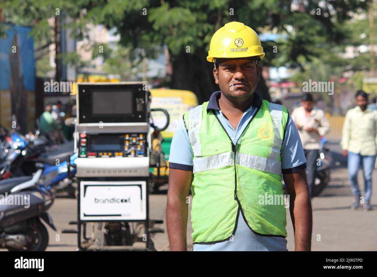 worker with Sewer Cleaning Robot, Unrecognizable road workers cleaning ...