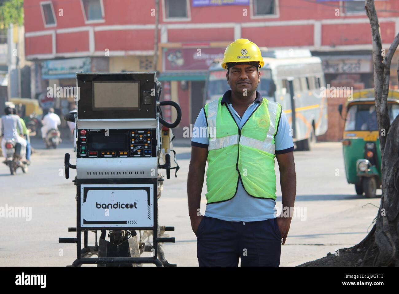 worker with Sewer Cleaning Robot, Unrecognizable road workers cleaning ...