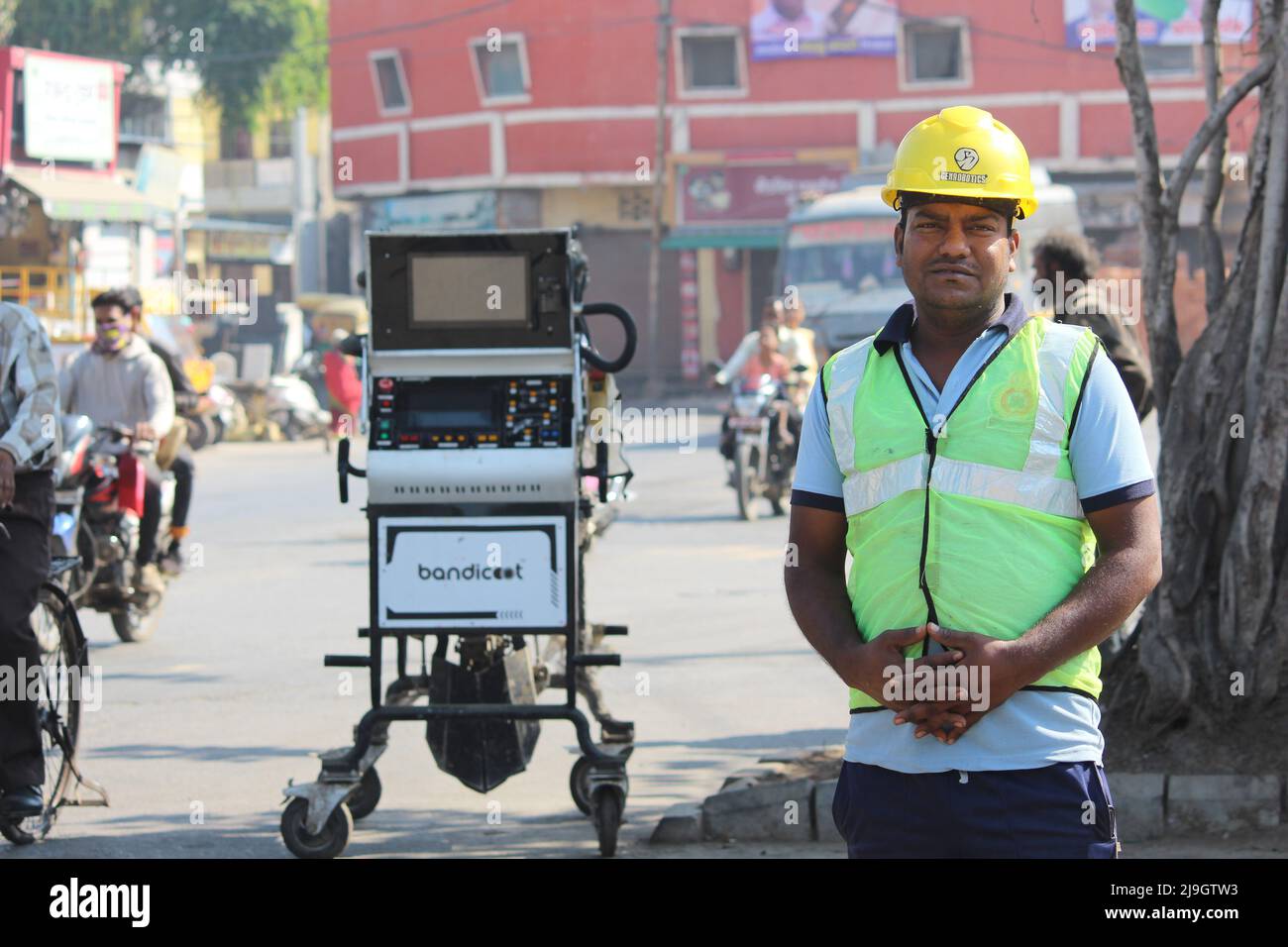 worker with Sewer Cleaning Robot, Unrecognizable road workers cleaning ...