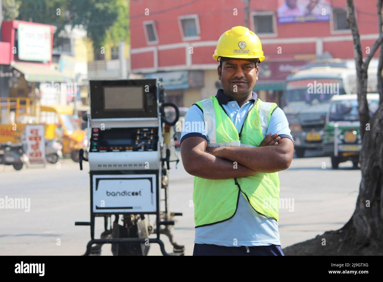 worker with Sewer Cleaning Robot, Unrecognizable road workers cleaning ...