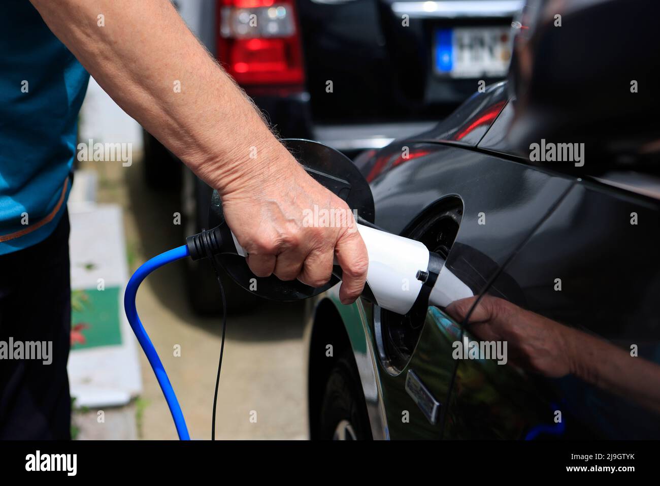 E-Mobility, Charging an electric car Stock Photo - Alamy