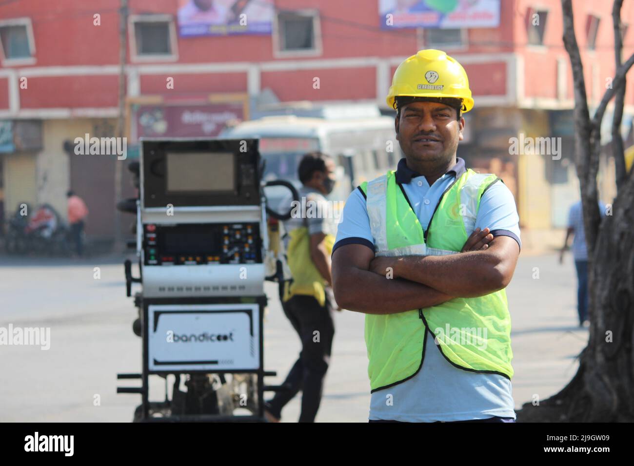 worker with Sewer Cleaning Robot, Unrecognizable road workers cleaning ...