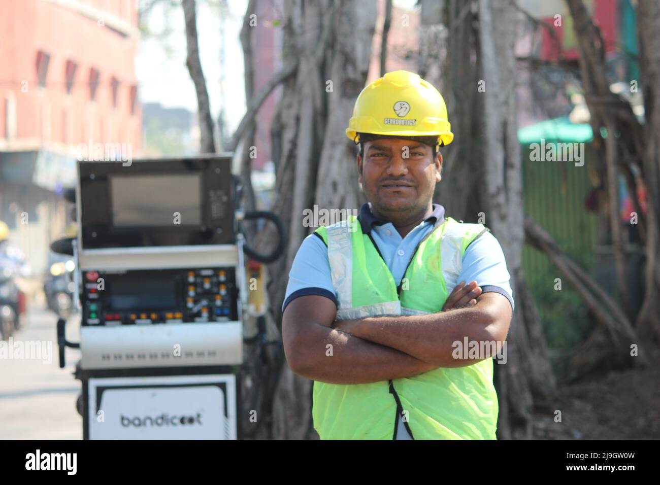 worker with Sewer Cleaning Robot, Unrecognizable road workers cleaning ...