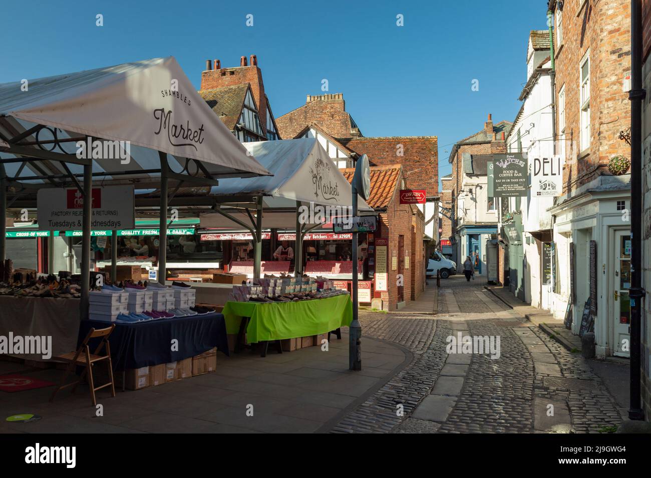 Spring morning at the Shambles Market in York city centre, England ...