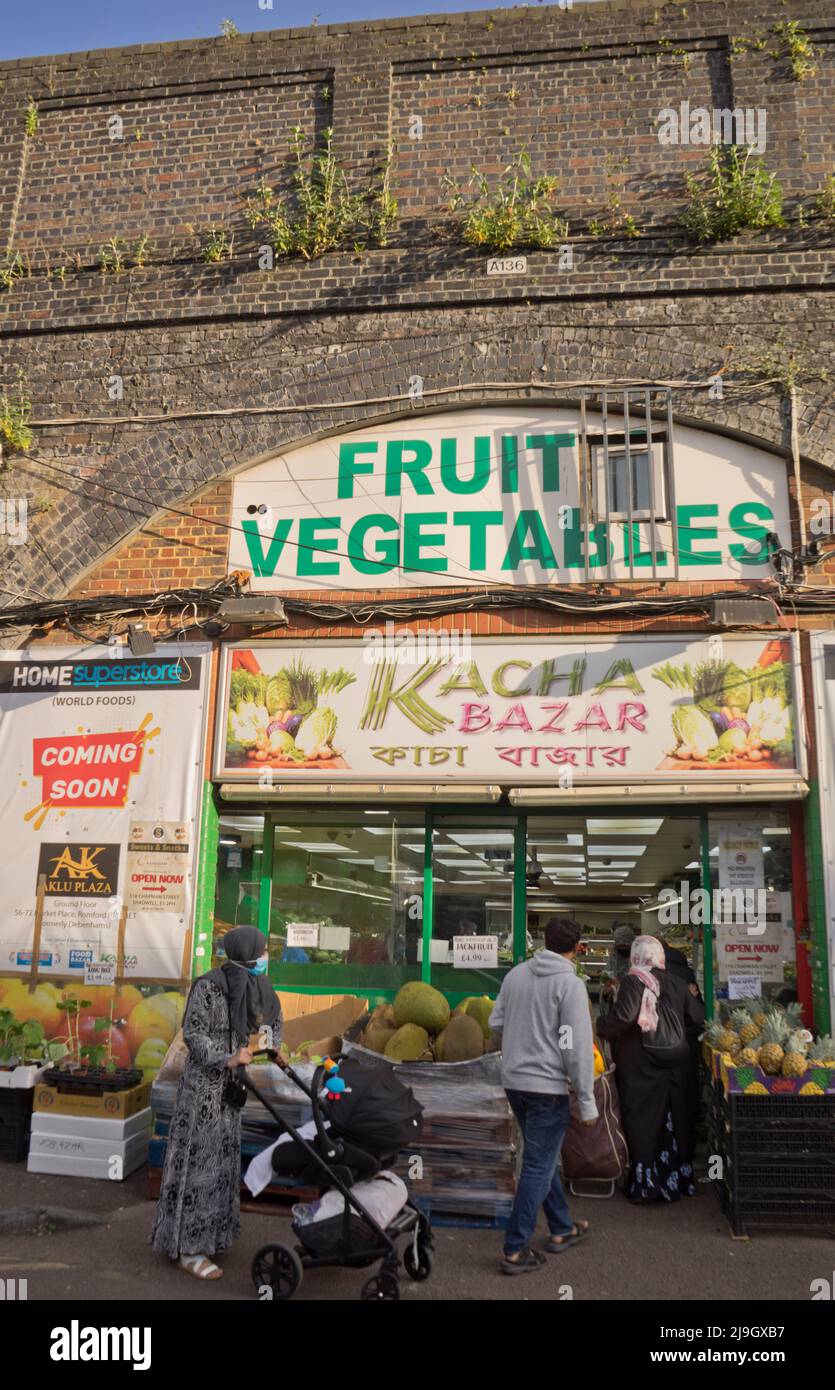 Local Muslim neighbours shopping at small Bangladeshi halal business ...