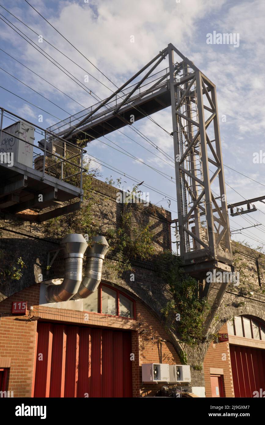 Small business redeveloped under railway arches by train and overground ...