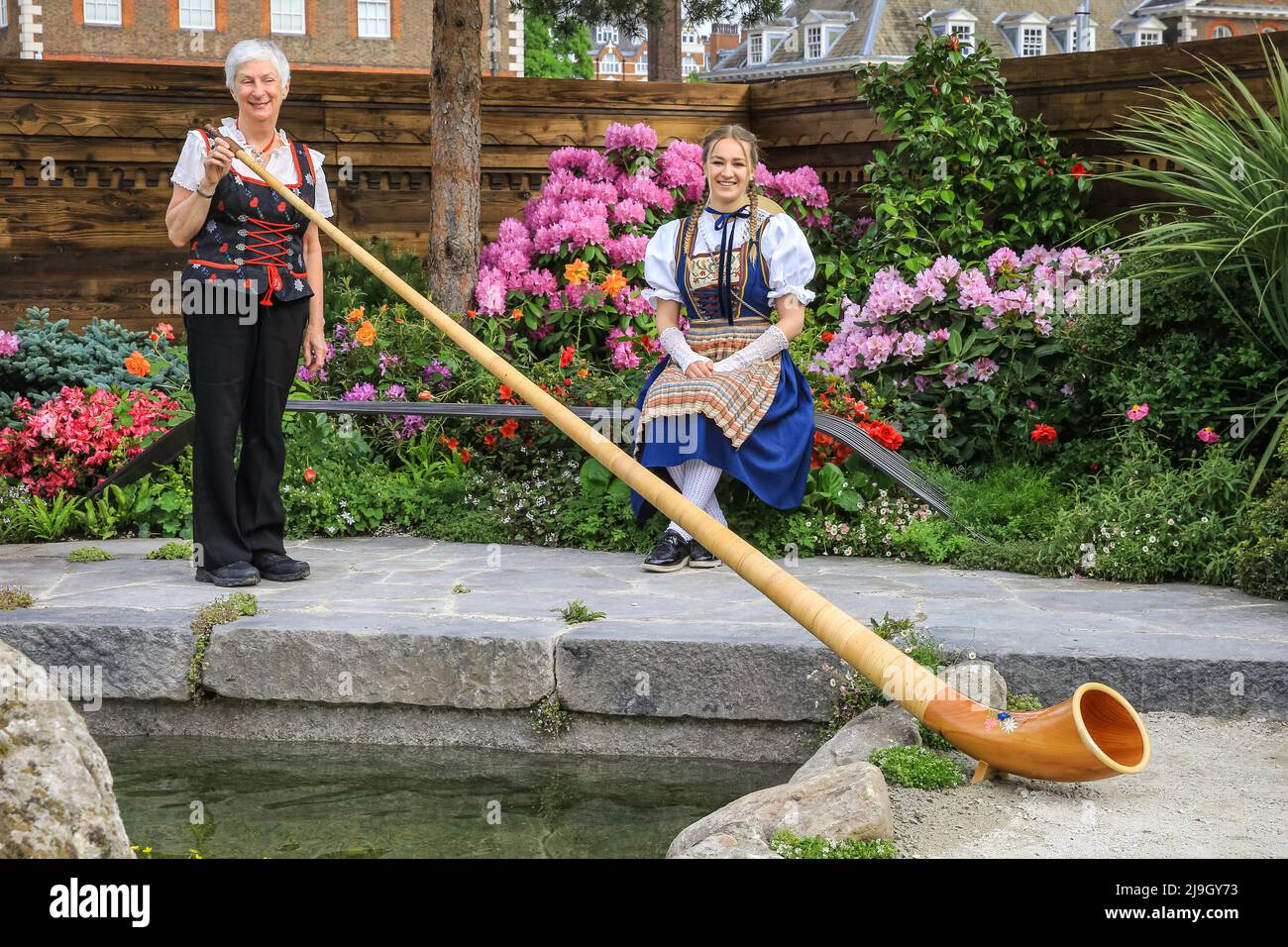 Chelsea, London, UK. 23rd May, 2022. An alphorn player in traditional ...