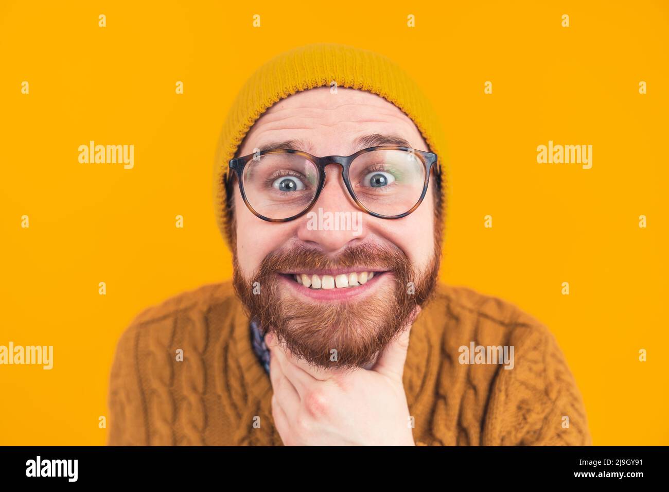 It's time to smile. Positive European lad showing his teeth in a big ...