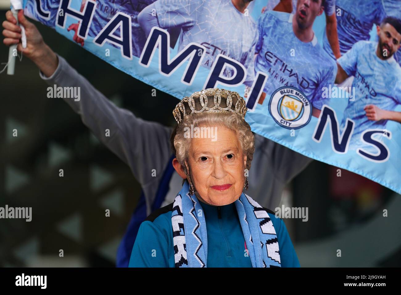 Manchester City fan with a Queen Elizabeth II mask during the Premier ...