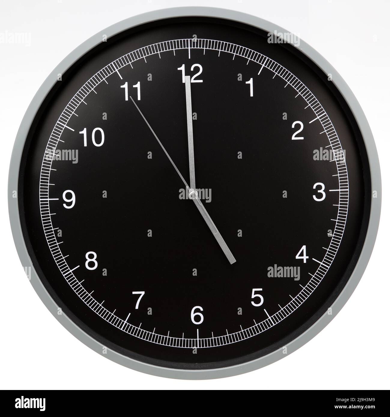 Wall clock showing five o'clock isolated on white background Stock ...