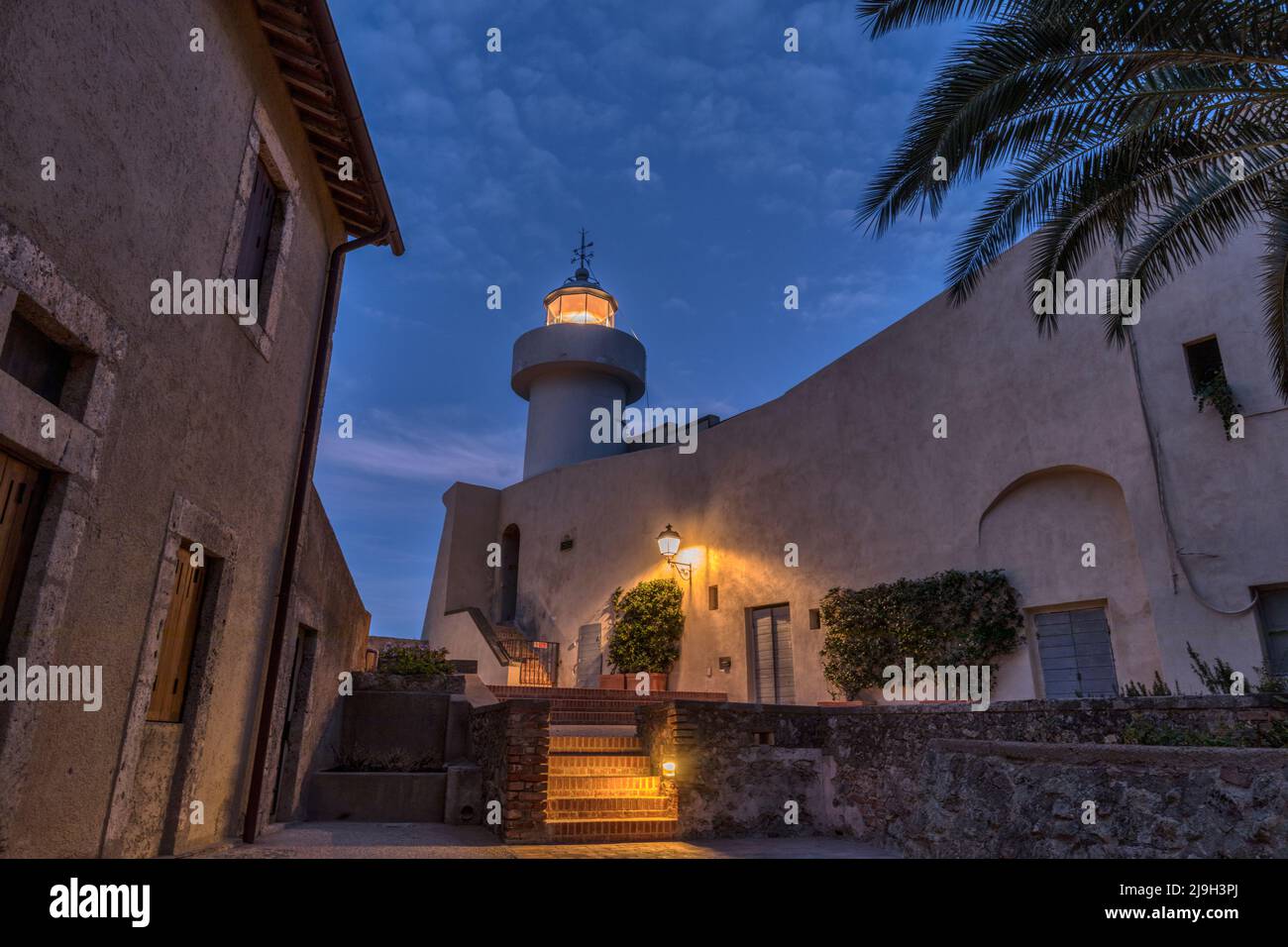 Lighthouse at twilight or night in 16th century, Rocca Spagnola ...