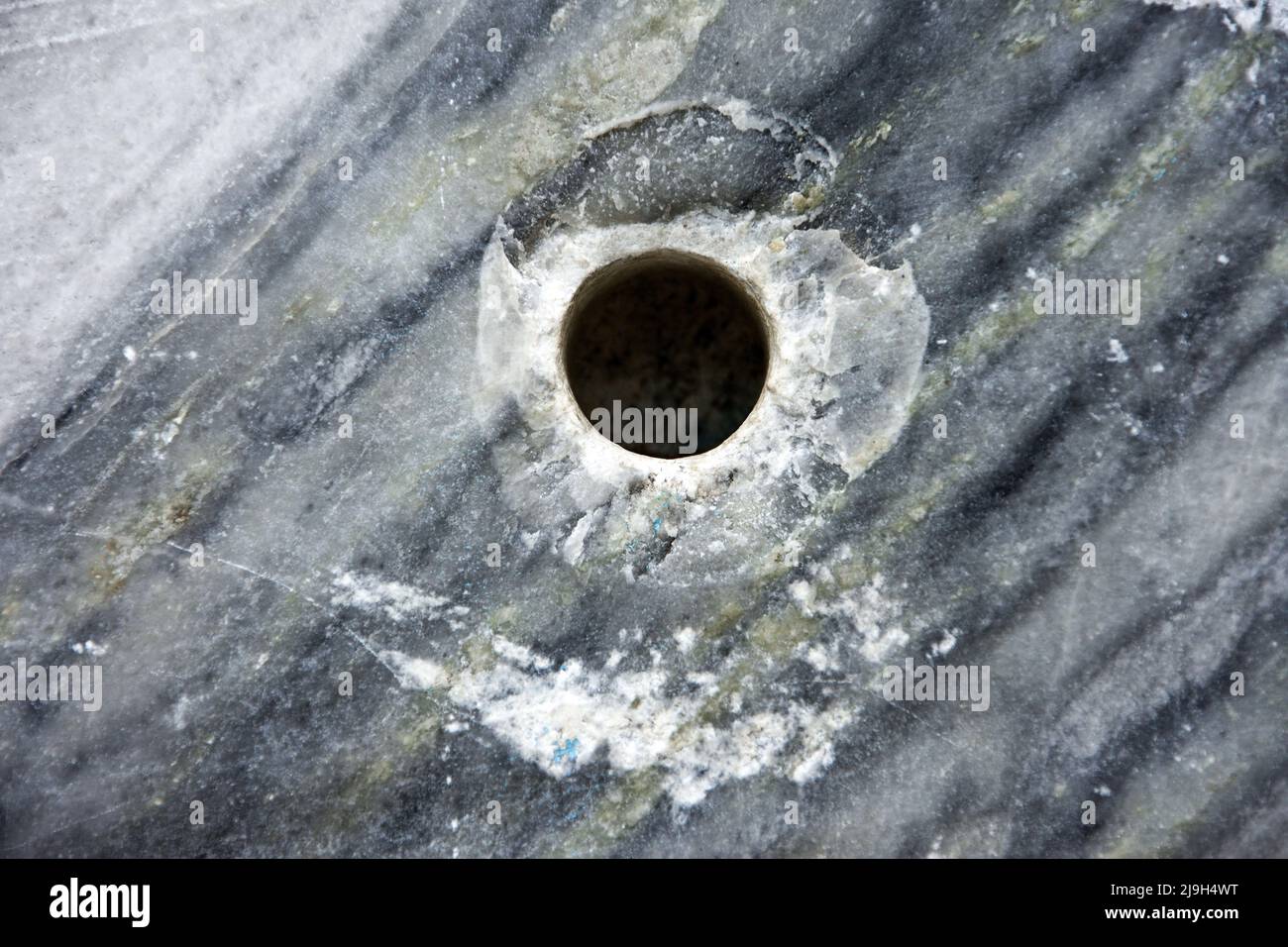 Marble as a background, drill hole Stock Photo - Alamy