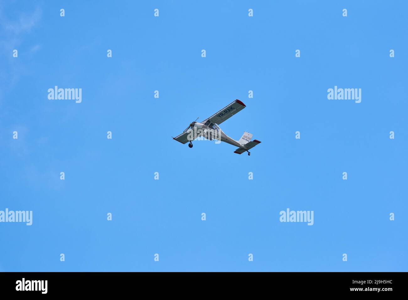 Utility aircraft PZL 104 WILGA 80 flying on the blue sky Stock Photo ...