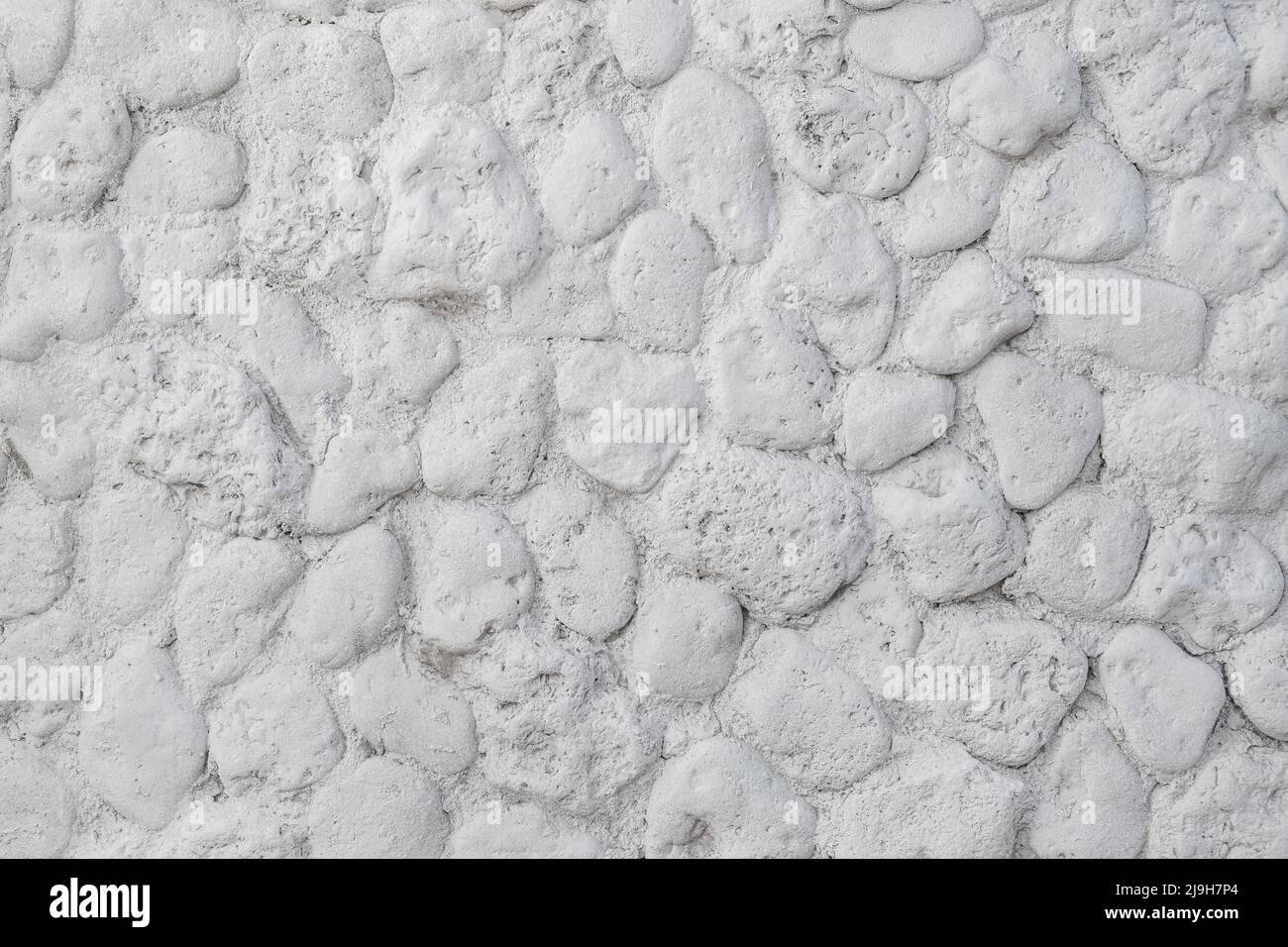 White wall made of natural stone. Texture light stone background Stock ...