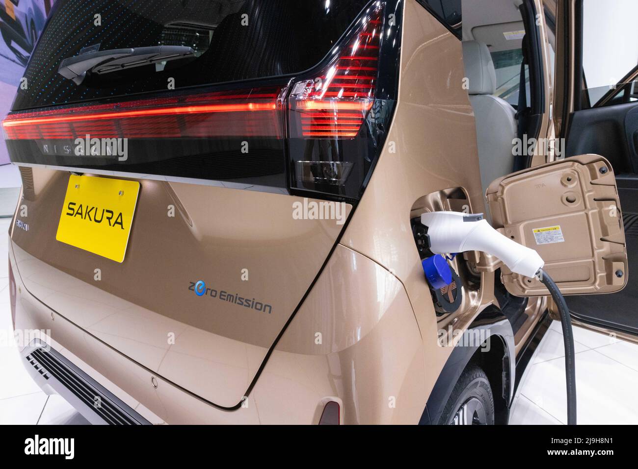 Yokohama, Japan. 23rd May, 2022. EV charging plug of the new Nissan ...