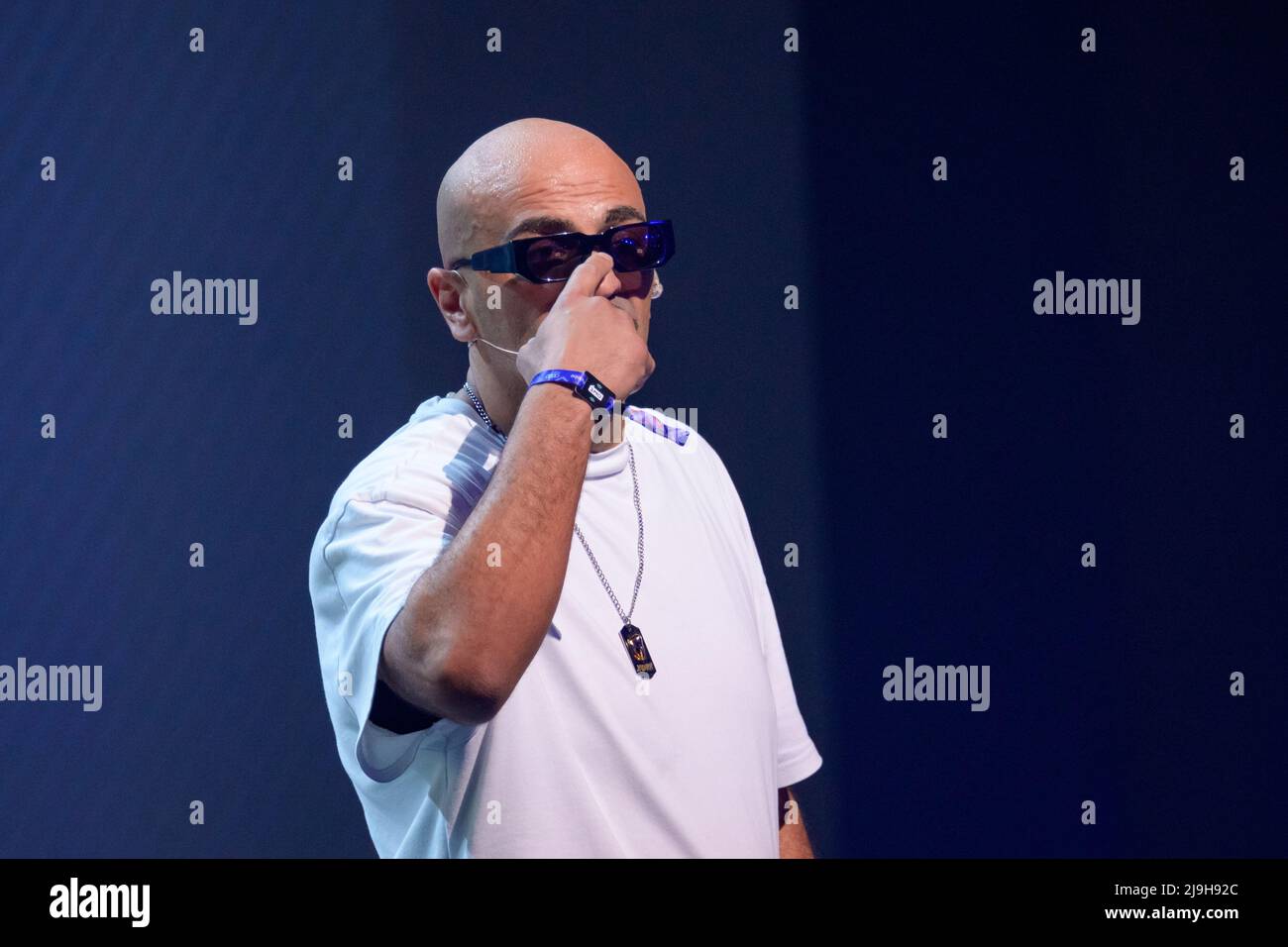Hamburg, Germany. 18th May, 2022. Rapper Xatar gestures on stage during ...