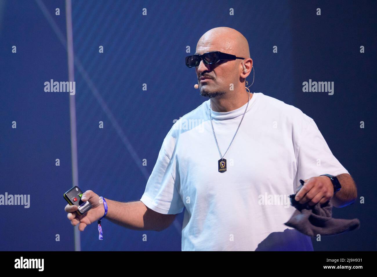 Hamburg, Germany. 18th May, 2022. Rapper Xatar gestures on stage during ...