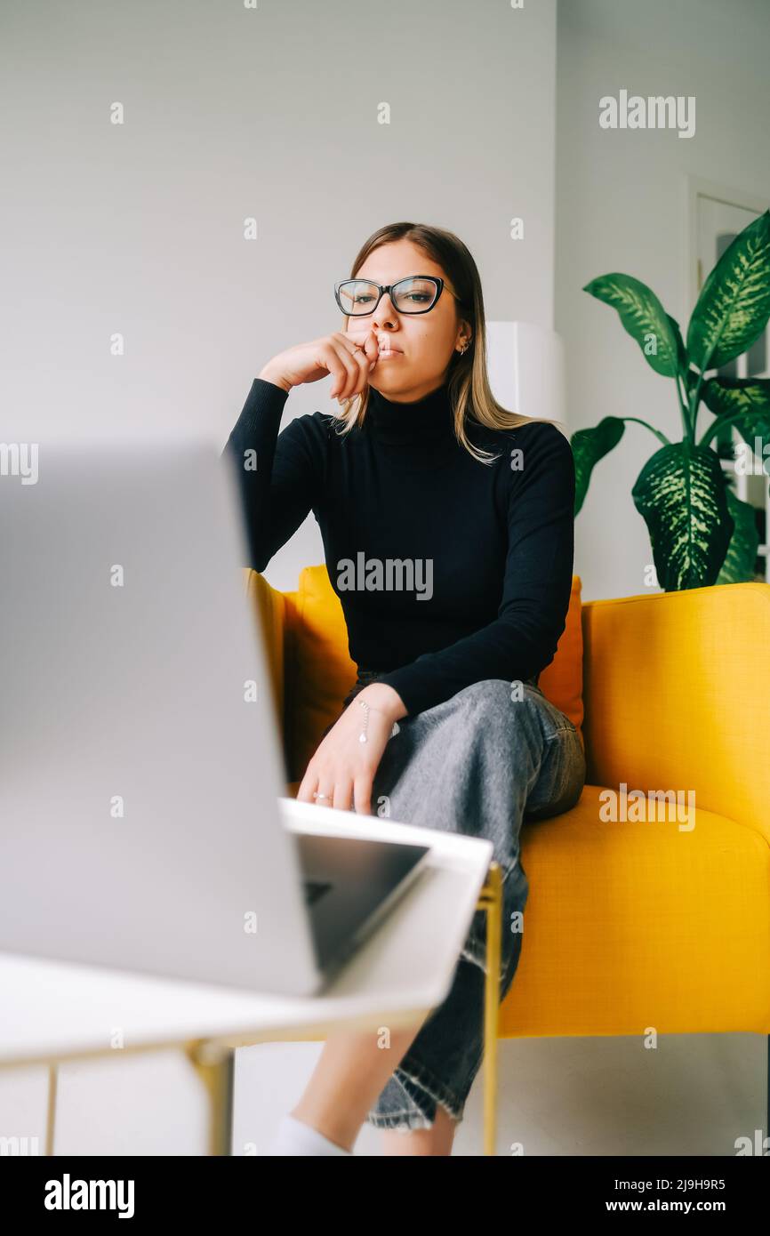 Caucasian businesswoman having video call on laptop, online ...