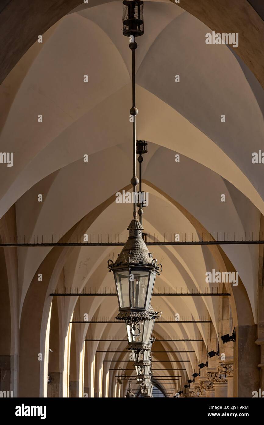 KRAKOW, POLAND - MAY 16, 2022: Vaulted arcade of the Cloth hall in the ...