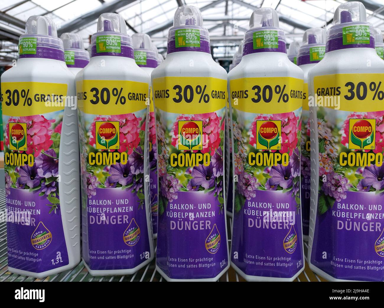 Compo liquid fertilizer for balcony plants in a market Stock Photo - Alamy