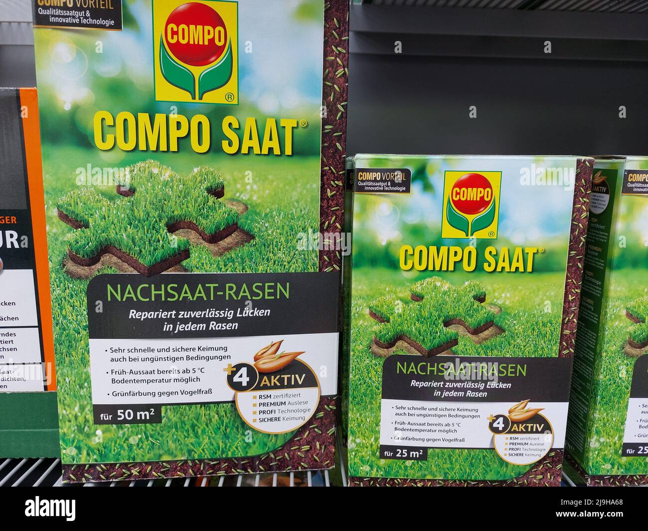 Compo fertilizer for lawn in a market Stock Photo - Alamy