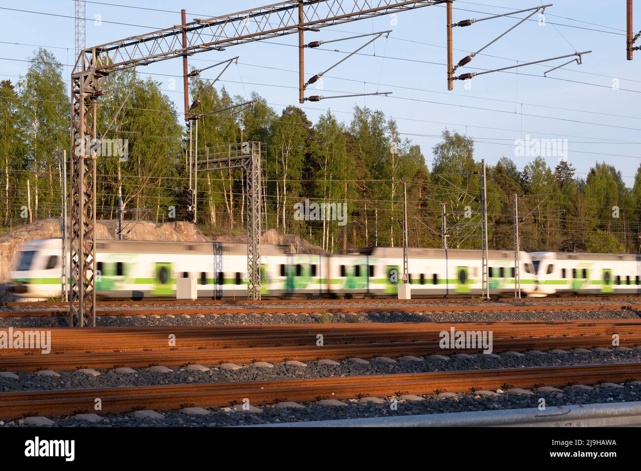 Helsinki / Finland - MAY 22, 2022: Unfocus train passing by a railway ...