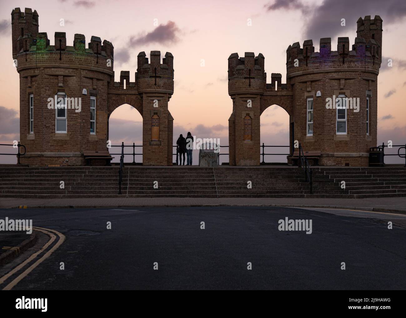 Withernsea Pier Towers Sunset Stock Photo - Alamy
