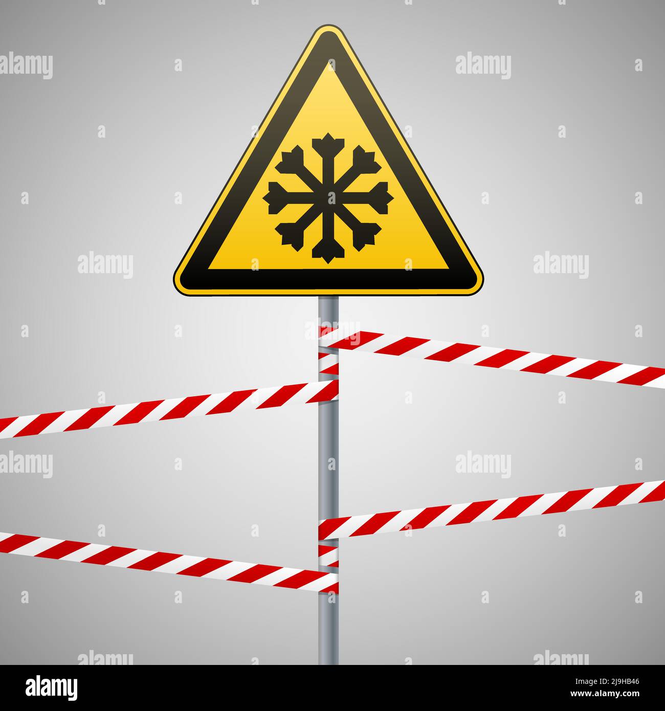 Carefully cold. Warning sign safety. pillar with sign and warning bands ...