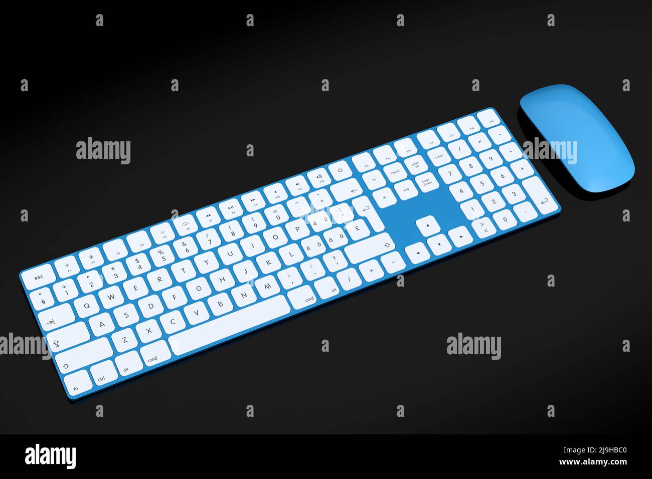 Modern blue aluminum computer keyboard and mouse isolated on black ...