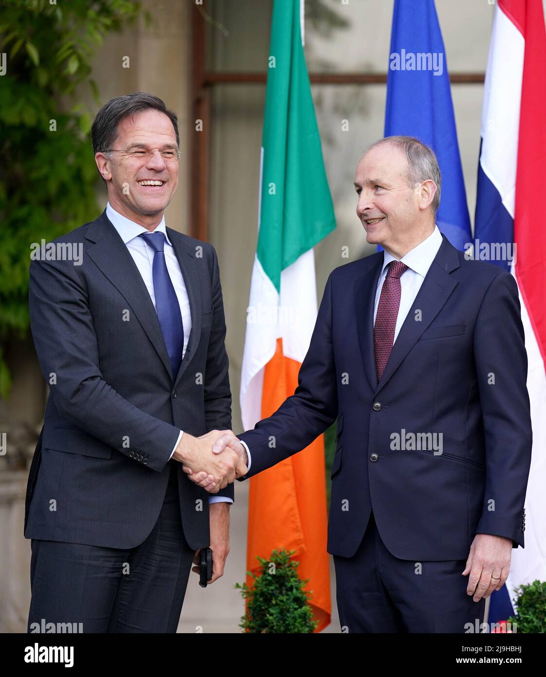 Prime Minister of the Netherlands, Mark Rutte (left) is greeted by ...