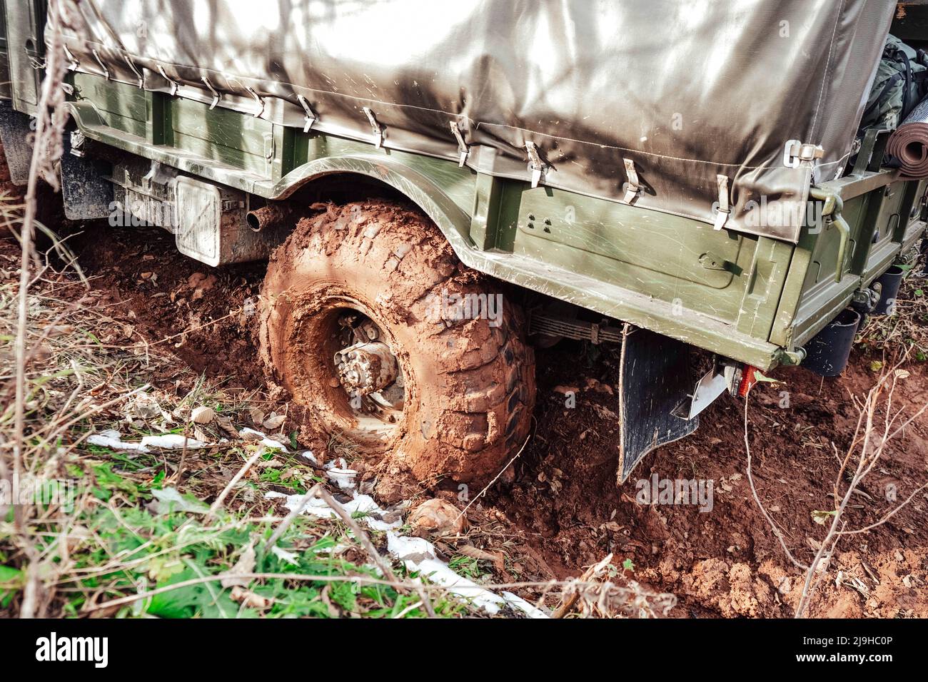 The wheel of the car stuck in the mud Stock Photo - Alamy