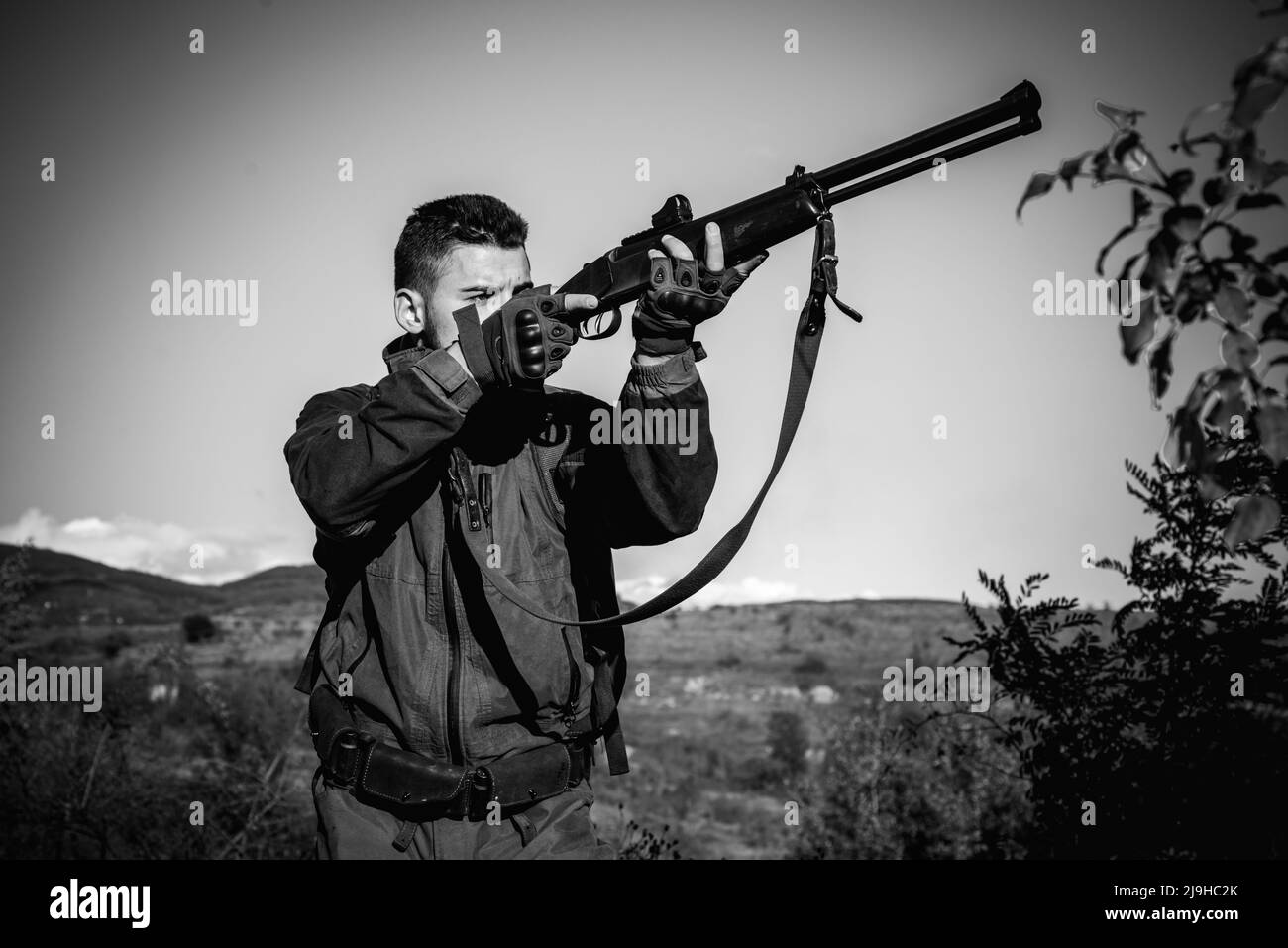 Hunter with shotgun gun on hunt. Calibers of hunting rifles. Hunter ...
