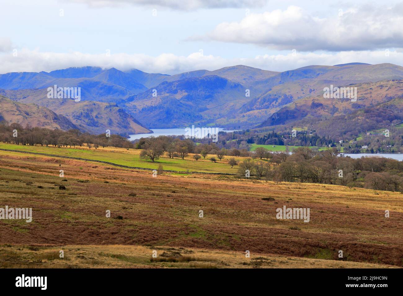 Ullswater and distant mountains from High Street Roman Road on Moor ...