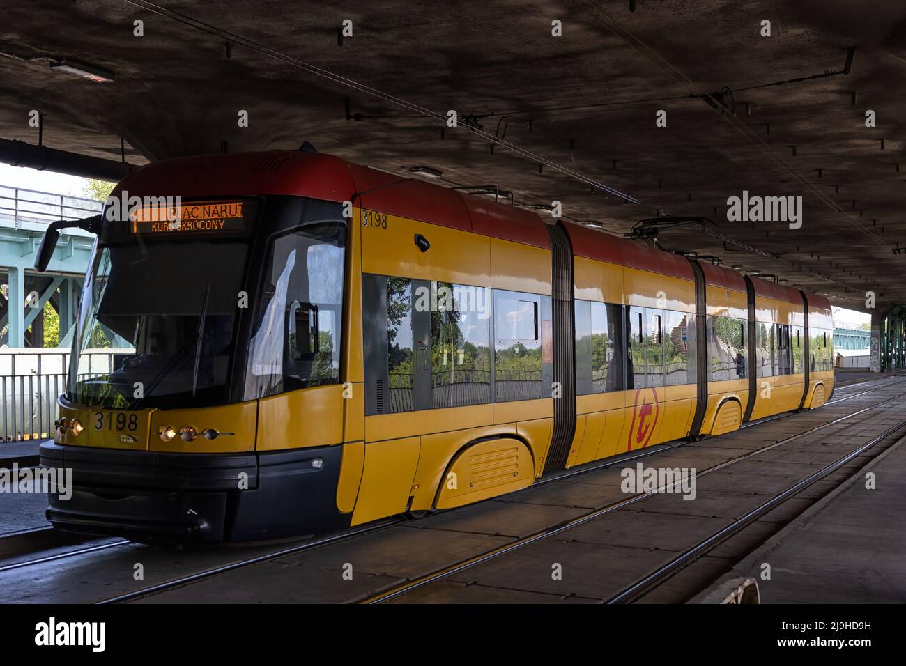 WARSAW, POLAND - MAY 17, 2022: Yellow Pesa Swing 120Na tram (#3198 ...